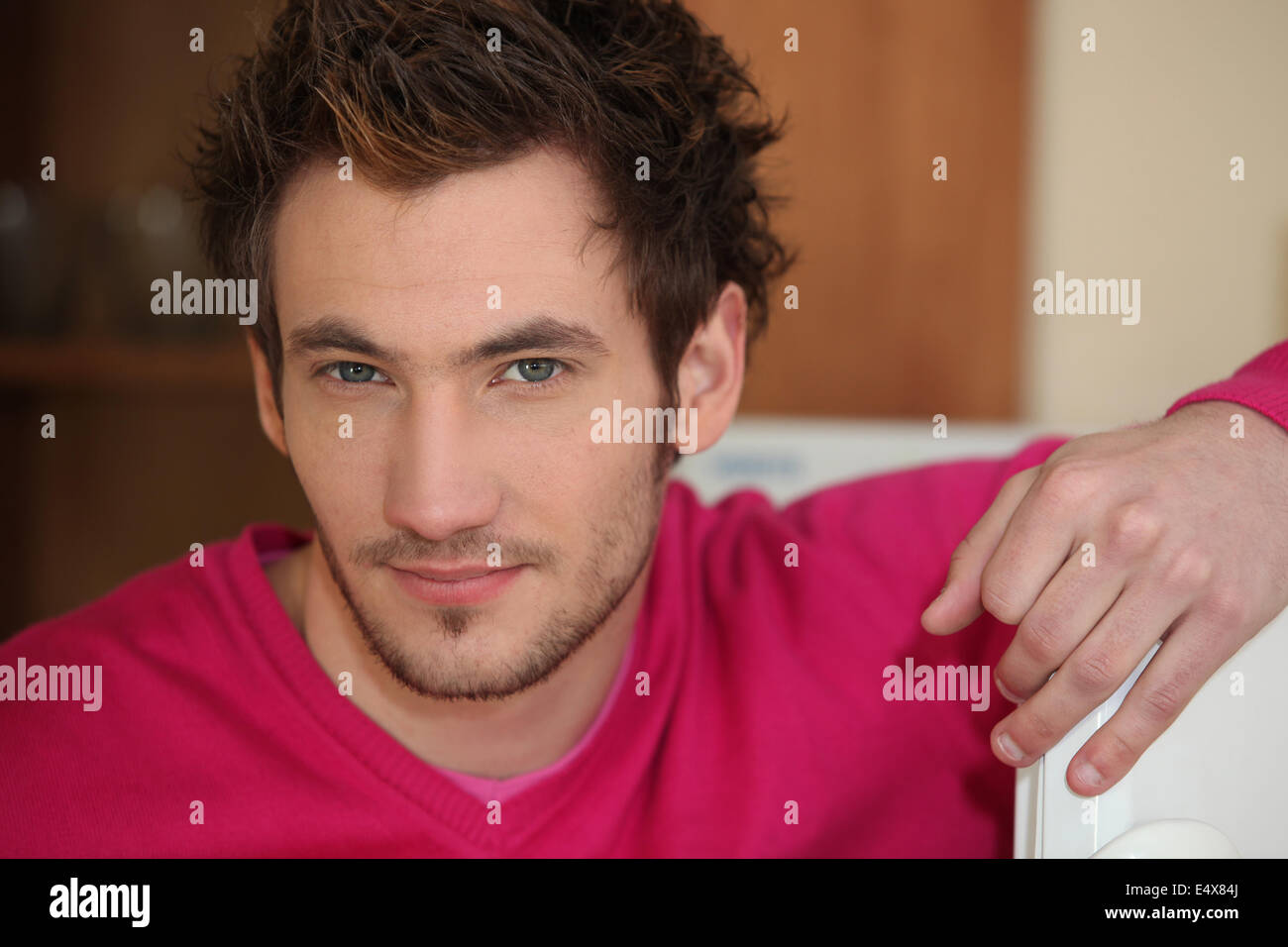 Casual young man relaxing at home Stock Photo - Alamy Casual young man relaxing at home Stock Photo - Alamy