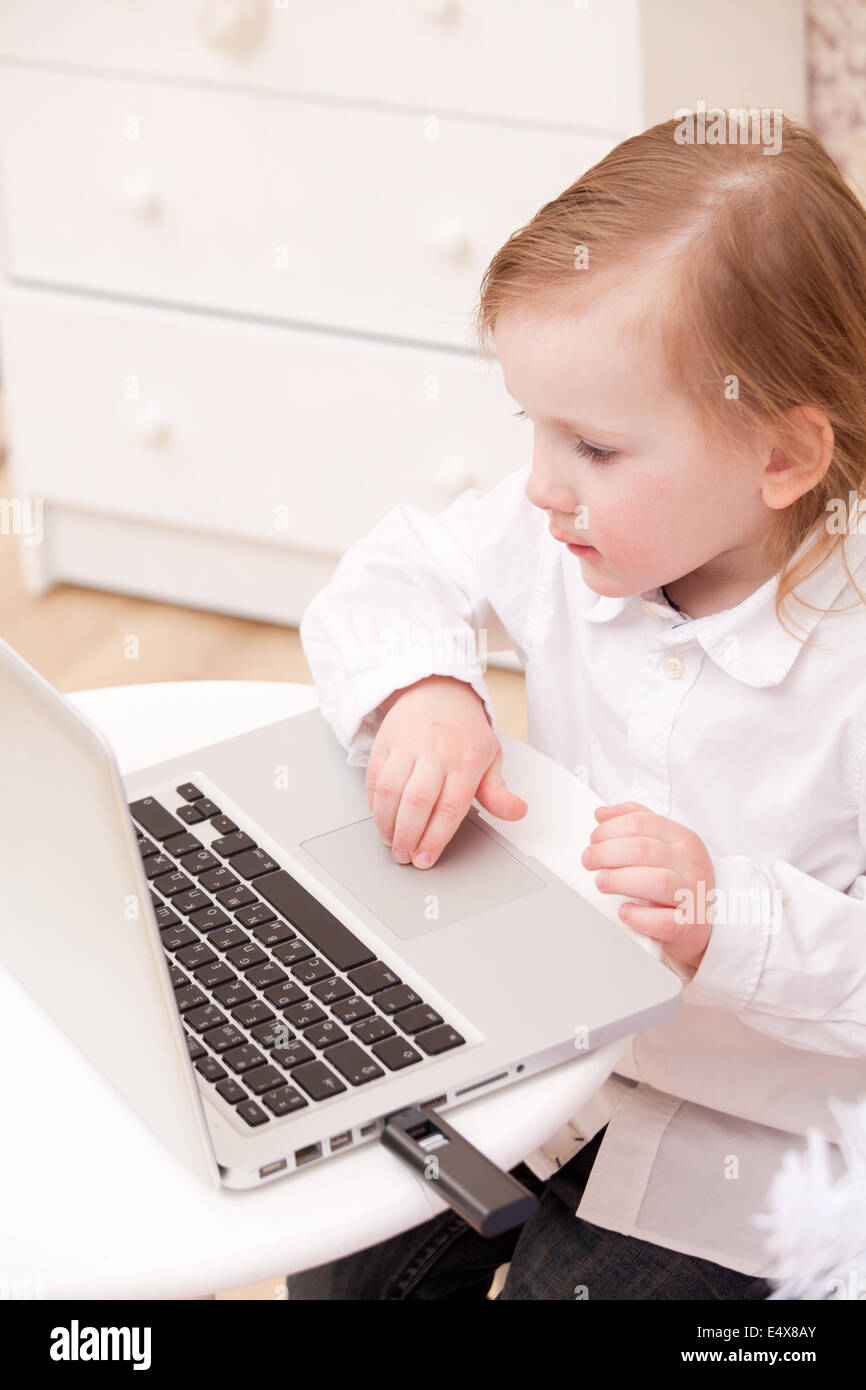 Child with laptop Stock Photo - Alamy