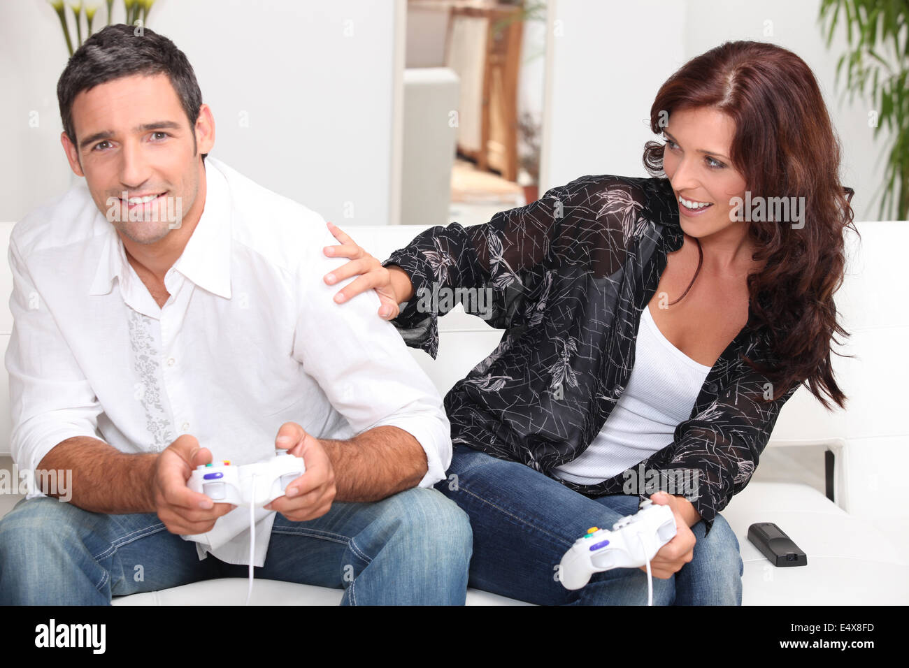 Adult couple playing computer games Stock Photo - Alamy