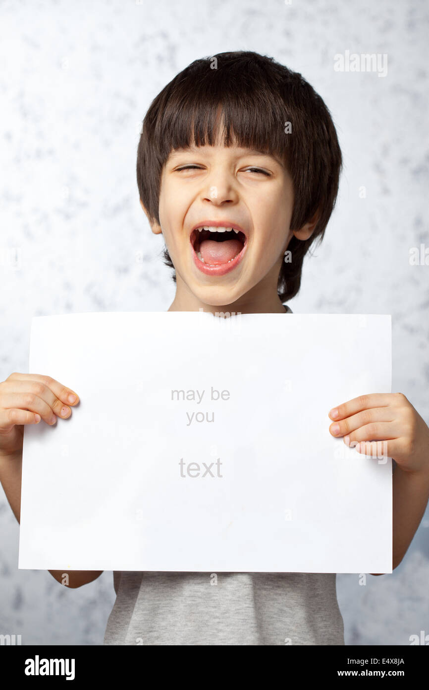 laughing boy with a poster in hands Stock Photo - Alamy