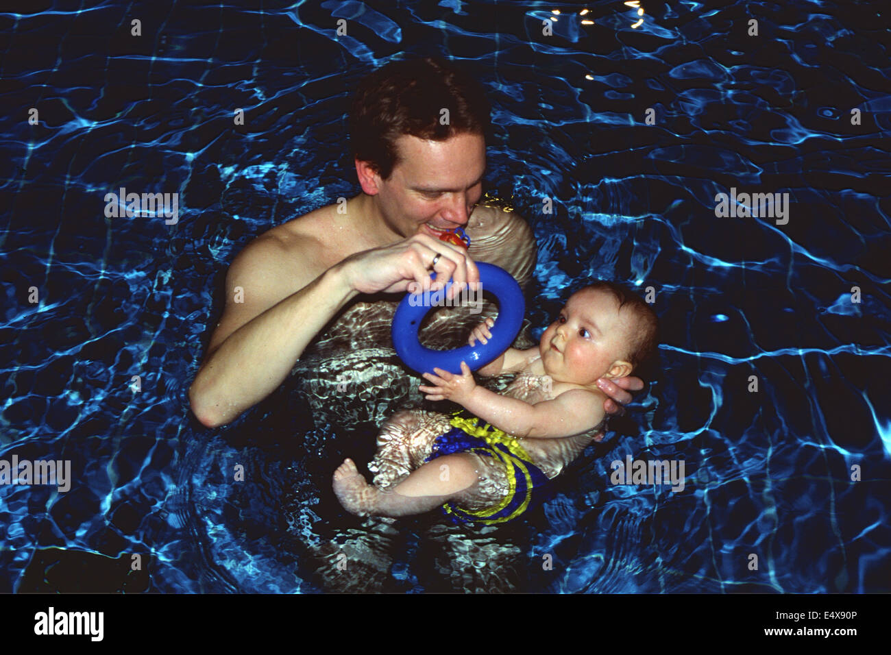 Infant swimming hi-res stock photography and images - Alamy