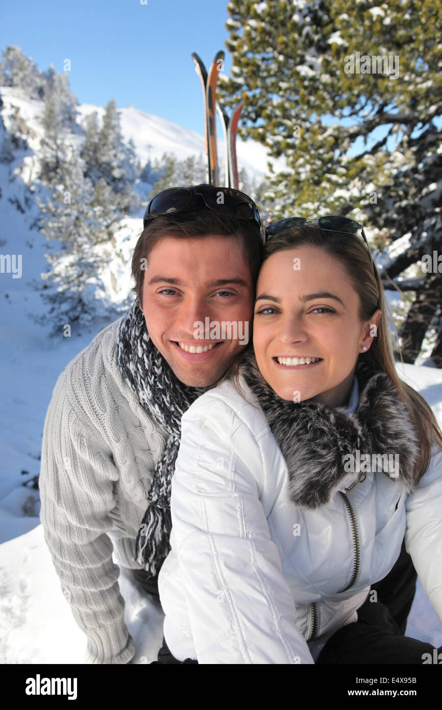 Portrait of a couple skiing in the Alps Stock Photo - Alamy