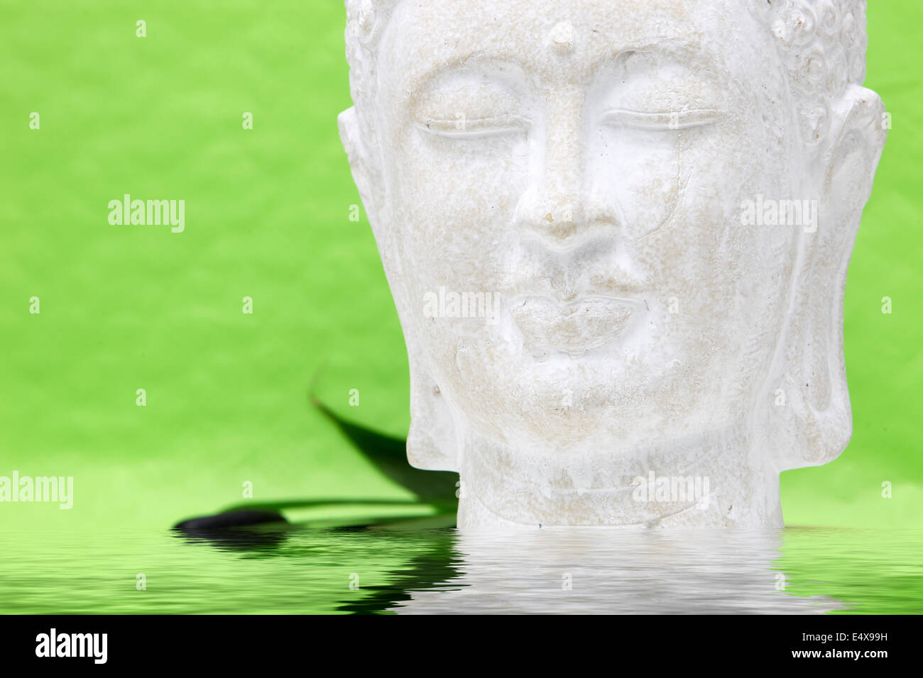 Head of meditating yoga statue Stock Photo - Alamy