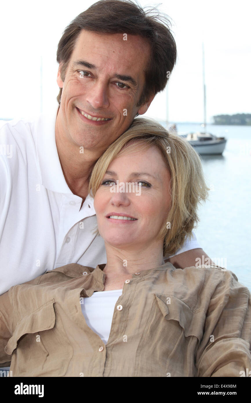 Romantic couple by the sea Stock Photo - Alamy