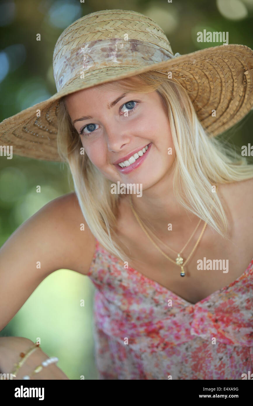 Woman wearing straw hat in hi-res stock photography and images - Alamy