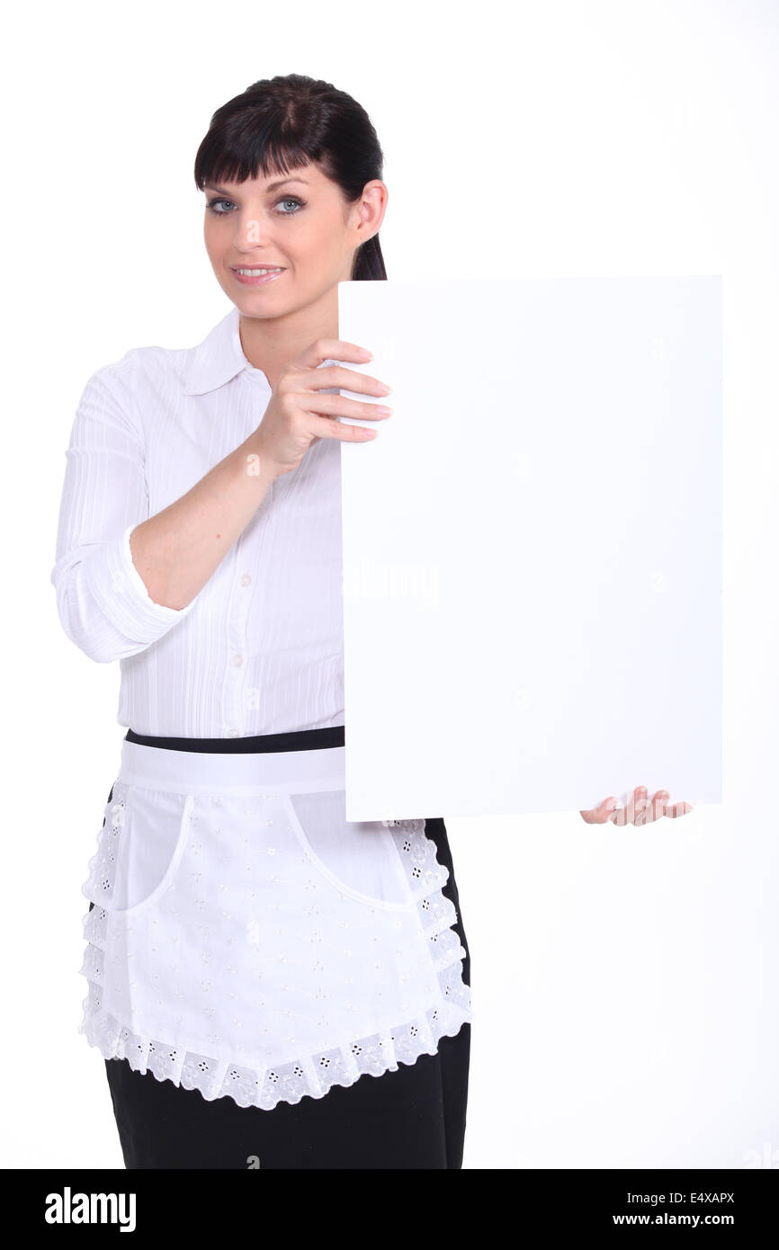 Waitress holding up a blank sign Stock Photo - Alamy