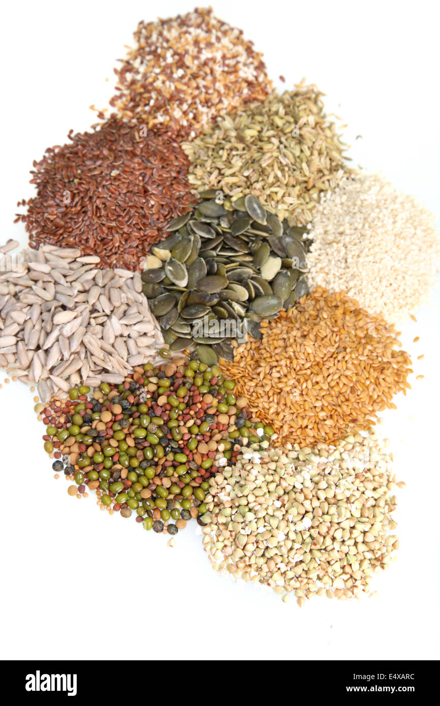 Mixed seeds arranged on a white background Stock Photo - Alamy