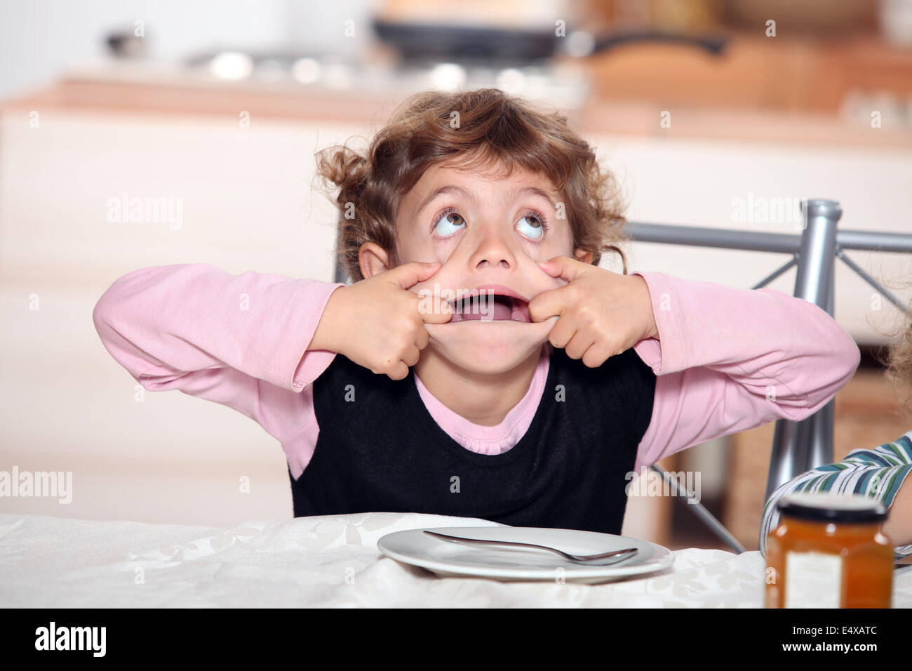 Pulling eye hi-res stock photography and images - Alamy