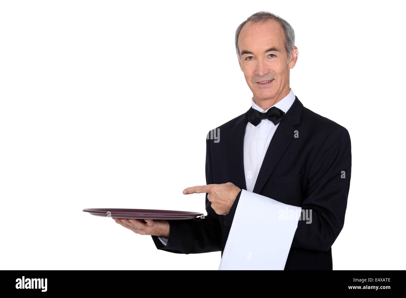 Waiter pointing to a tray Stock Photo - Alamy