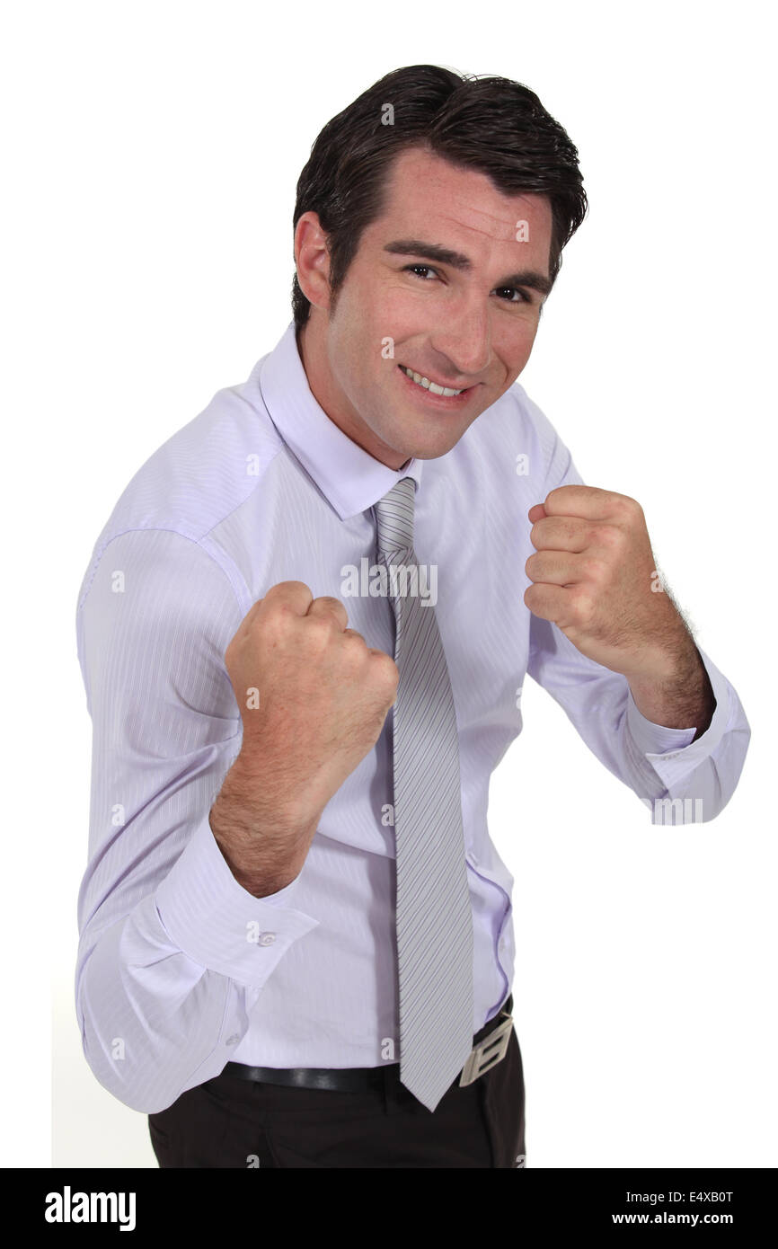 smiling businessman ready for fight Stock Photo - Alamy