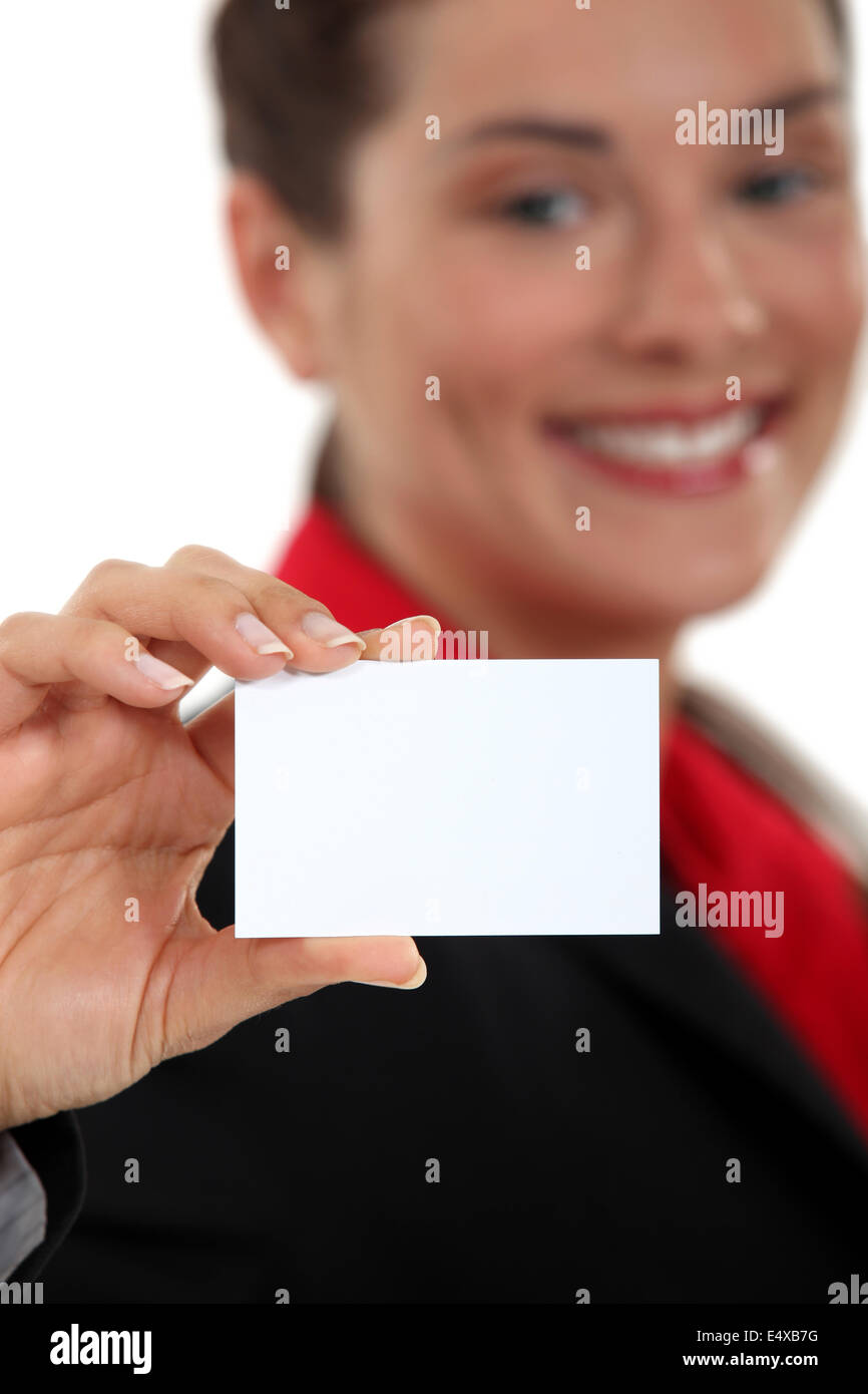 Businesswoman presenting card Stock Photo - Alamy