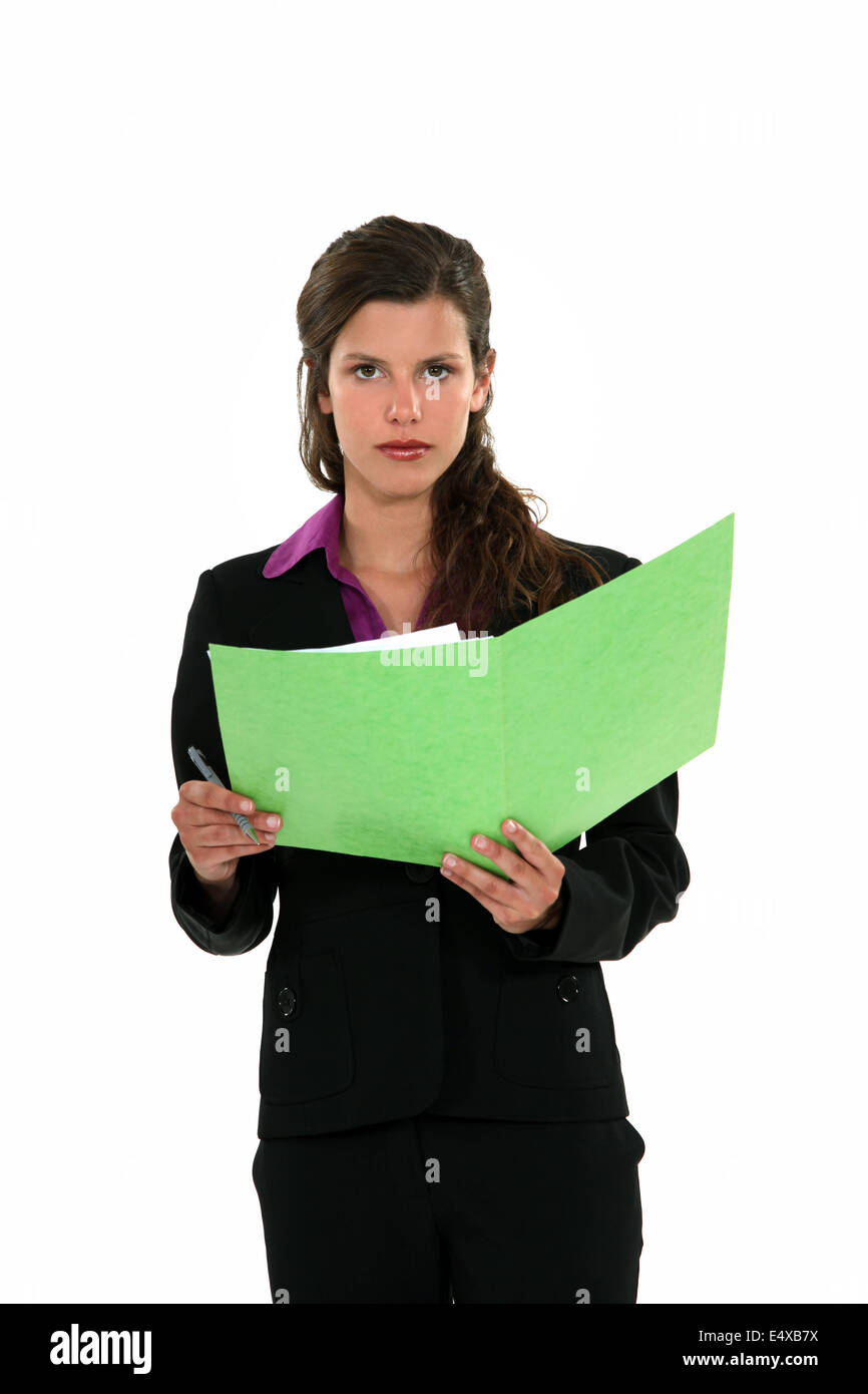 Female employee reading document hi-res stock photography and images ...