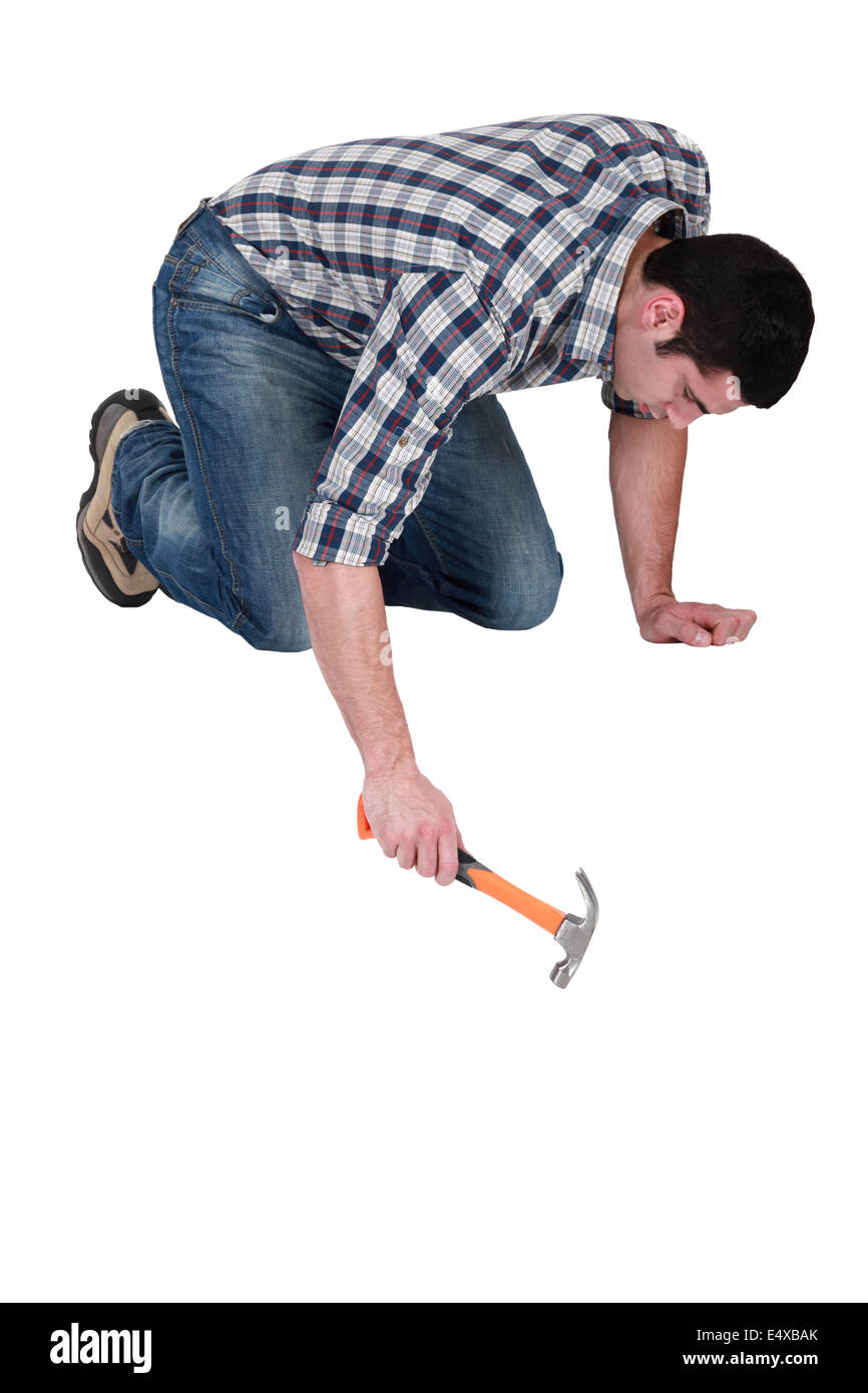 Man using a hammer Stock Photo - Alamy
