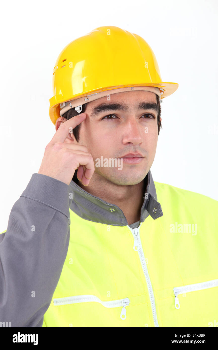 Construction worker thinking hi-res stock photography and images - Alamy