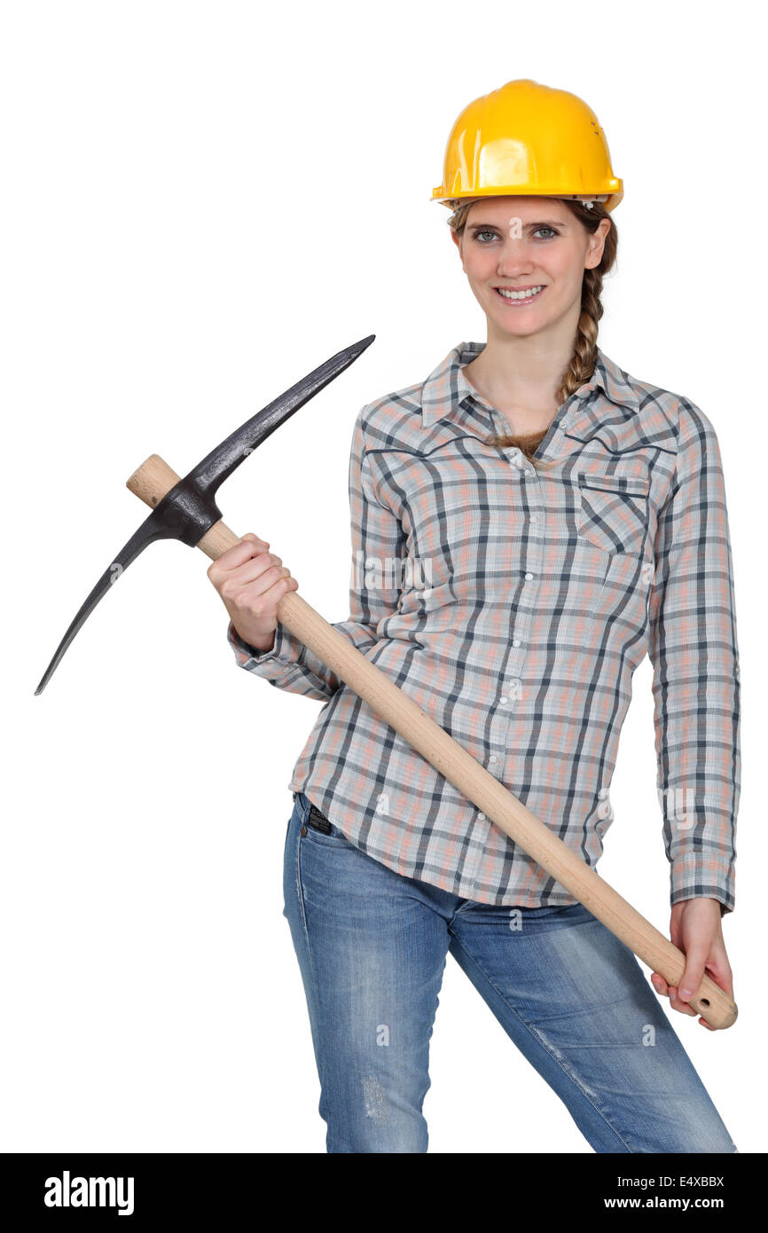 Woman posing with pick-axe Stock Photo - Alamy
