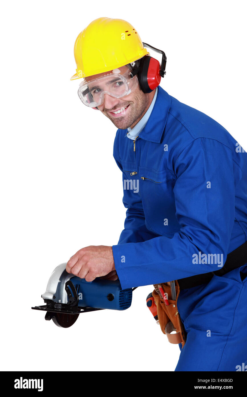 craftsman working with a cutting machine Stock Photo - Alamy