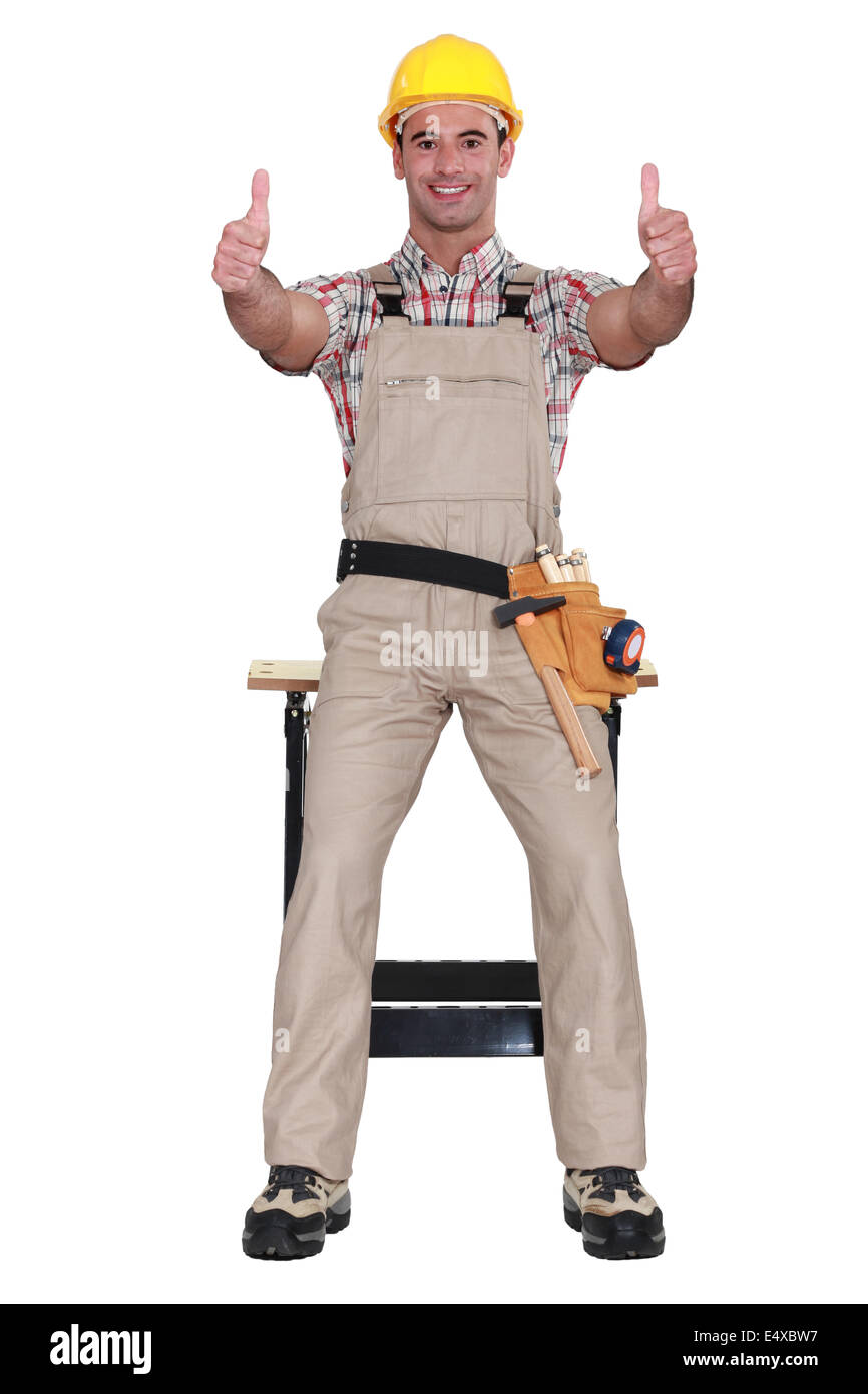 Carpenter giving the thumbs up Stock Photo - Alamy