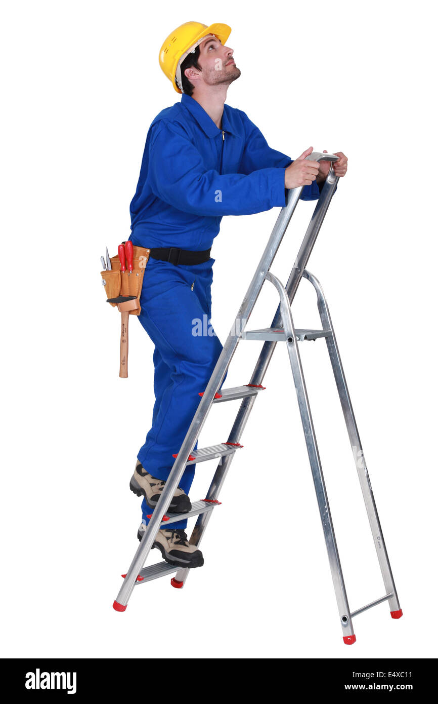 Worker on a stepladder Stock Photo - Alamy