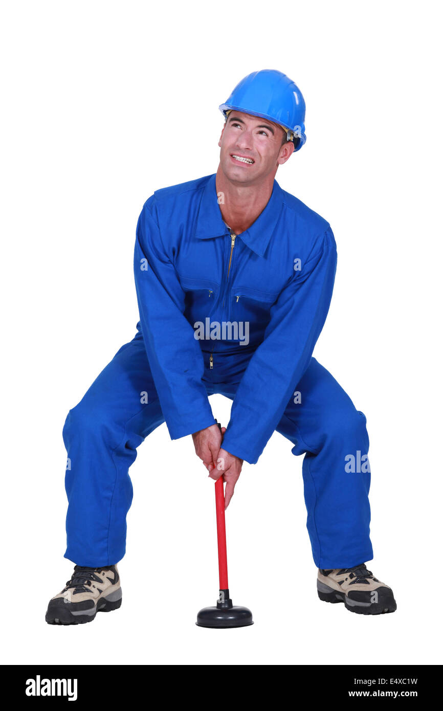 Plumber with plunger Stock Photo - Alamy