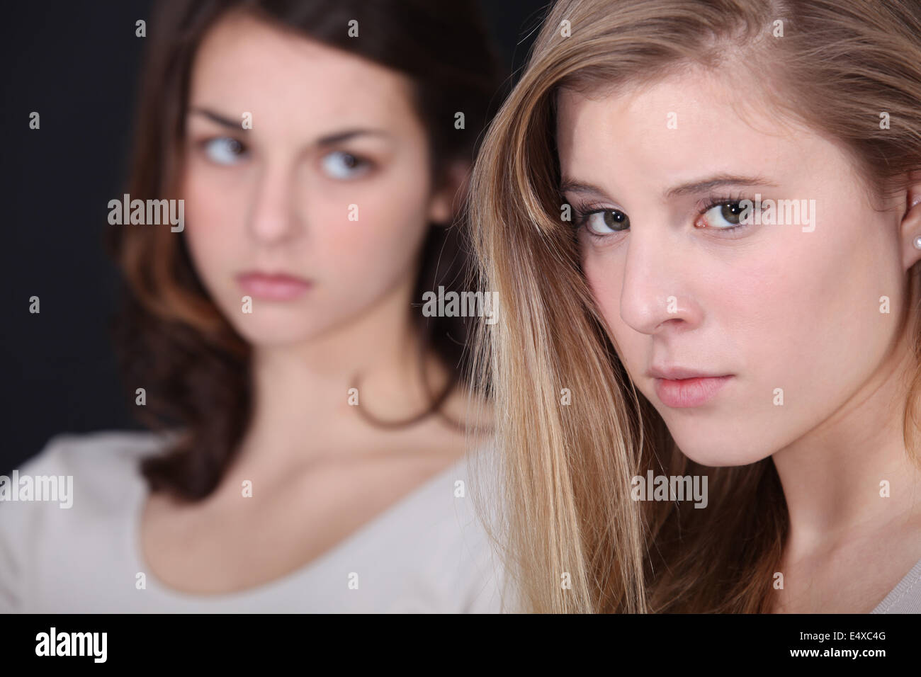 Two young women post-argument Stock Photo - Alamy