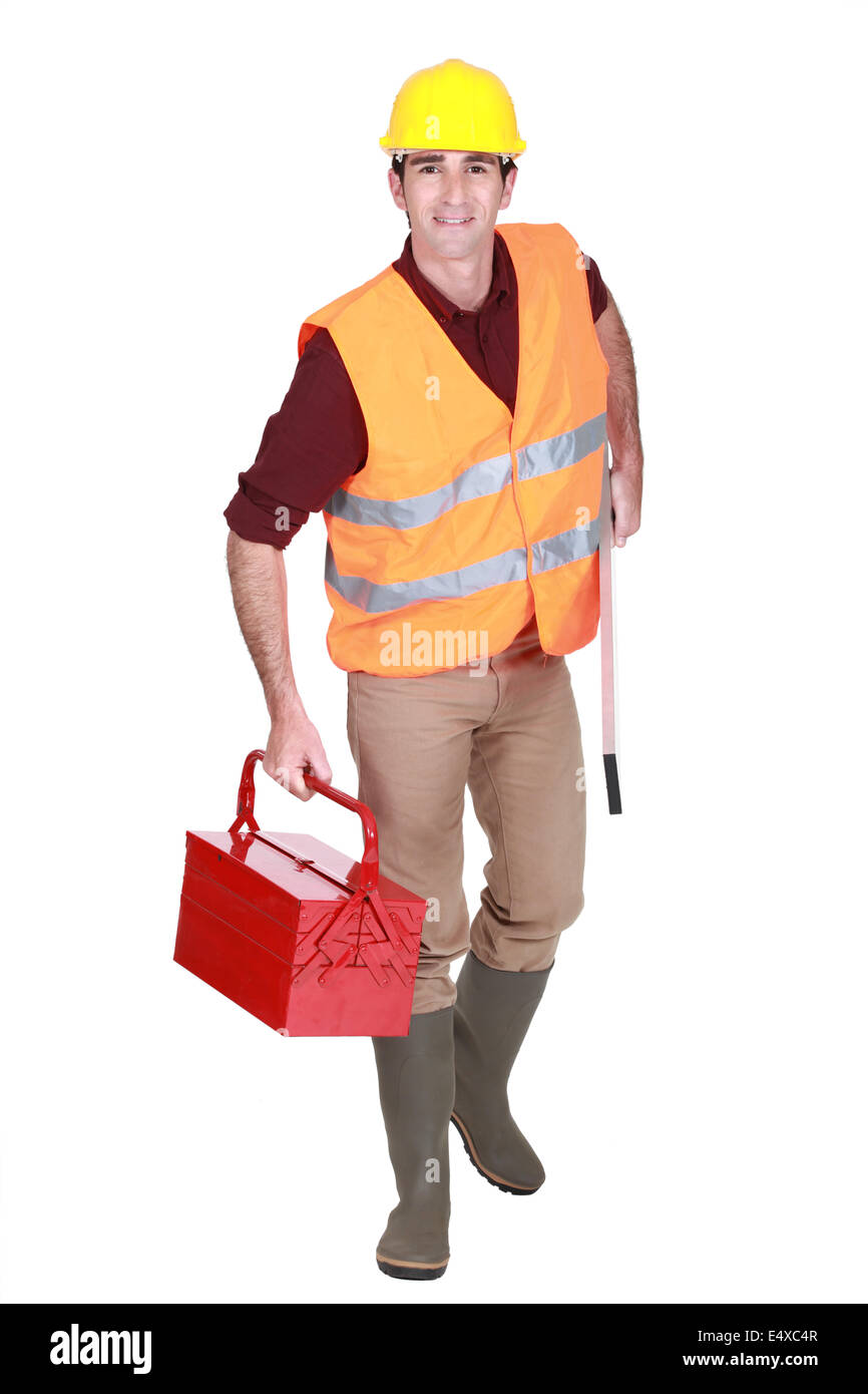 Worker with a tool box Stock Photo - Alamy