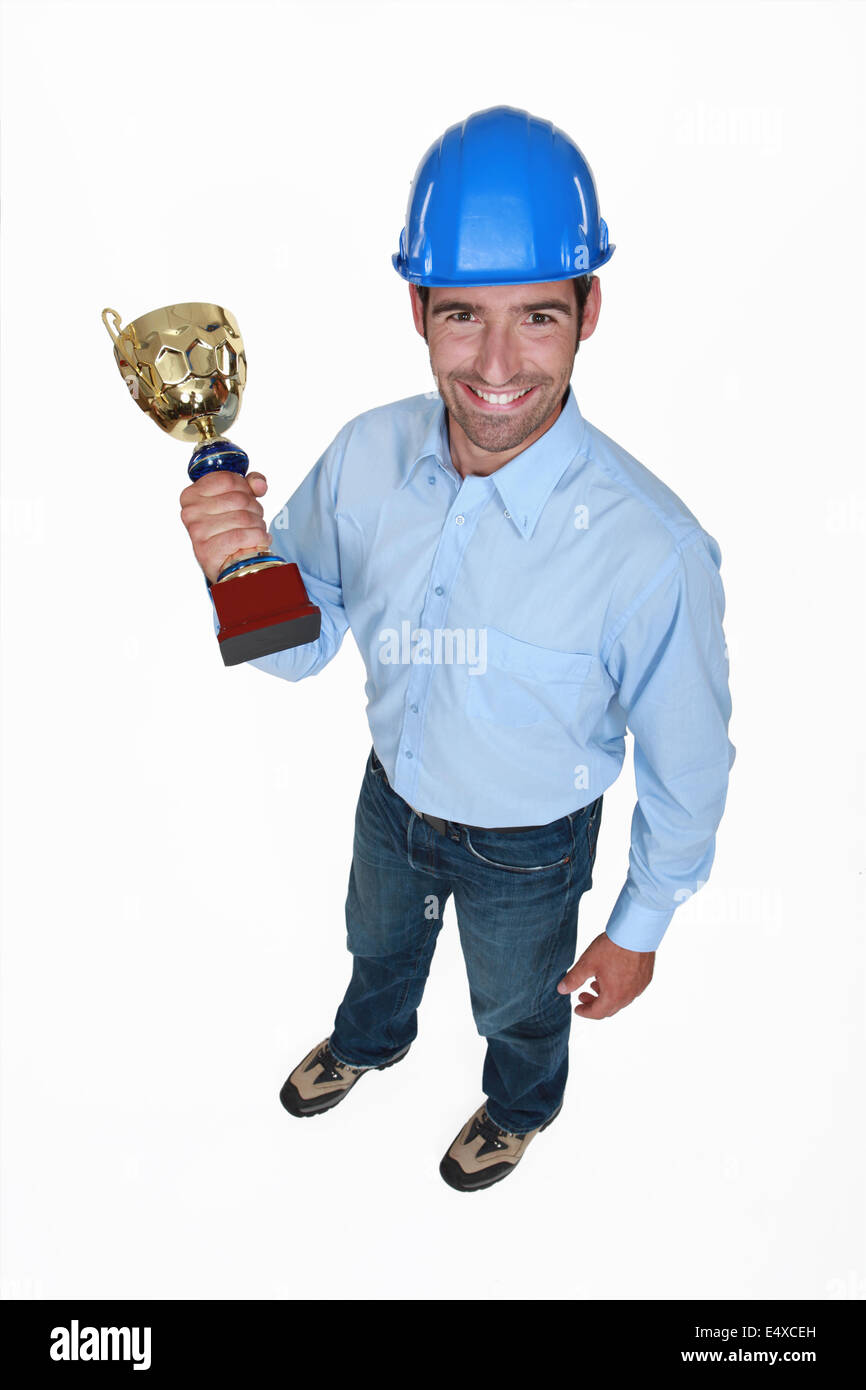 Architect with a trophy Stock Photo - Alamy