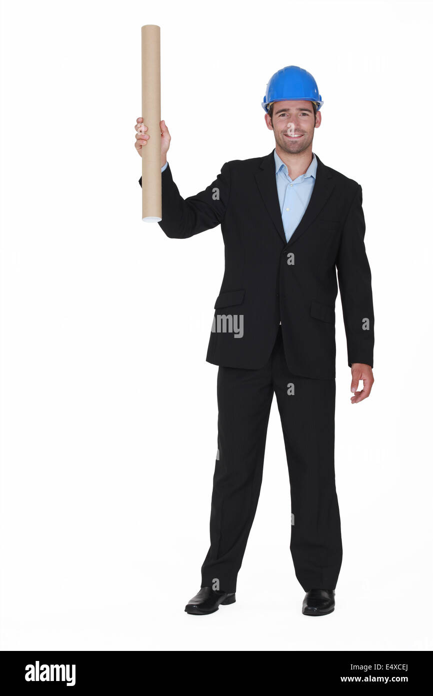 Engineer holding a building plan Stock Photo - Alamy