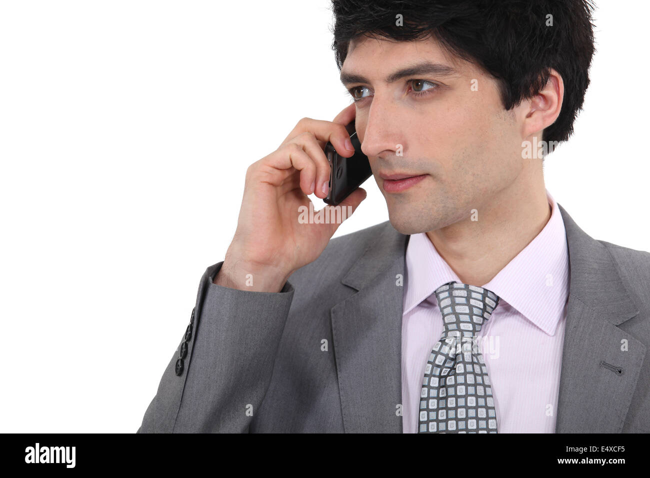 Businessman taking a call on his mobile Stock Photo - Alamy