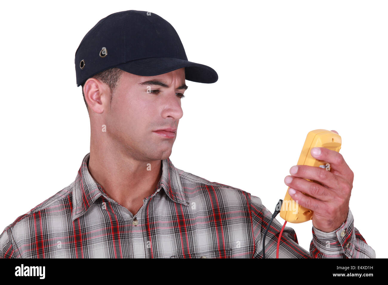 Man with a voltmeter Stock Photo - Alamy