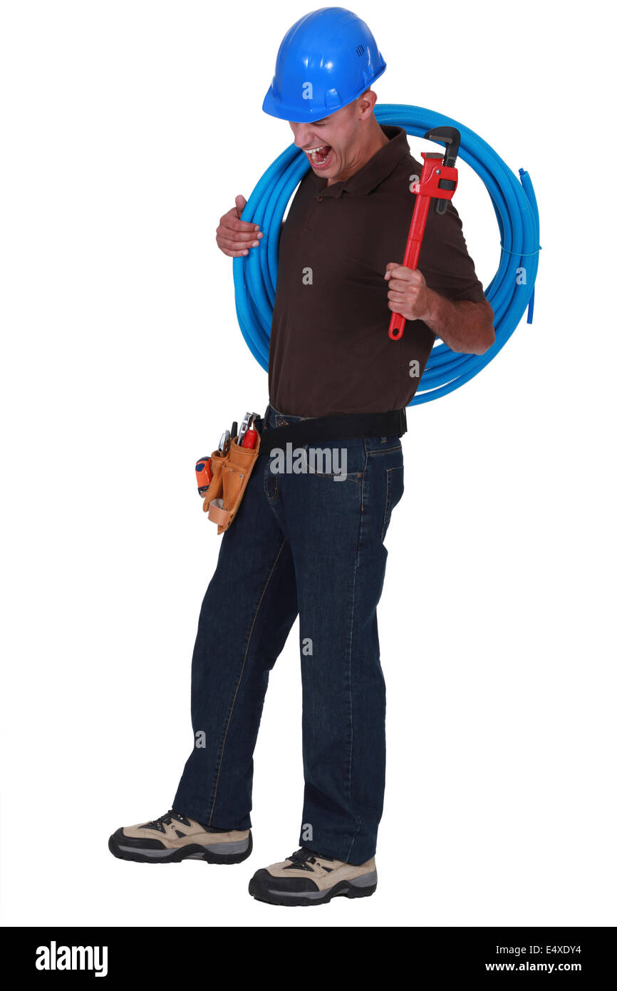 Construction worker carrying pipe hi-res stock photography and images ...