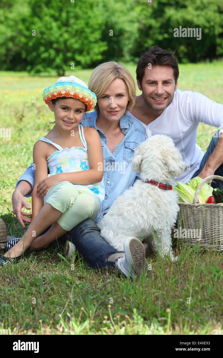 Family with dog Stock Photo - Alamy