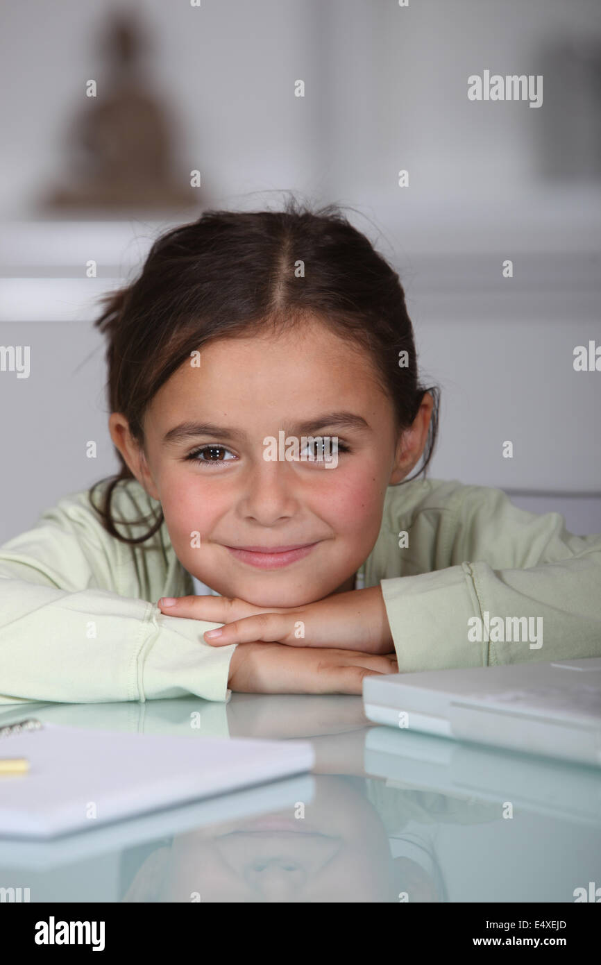 cute little girl doing her homework Stock Photo - Alamy