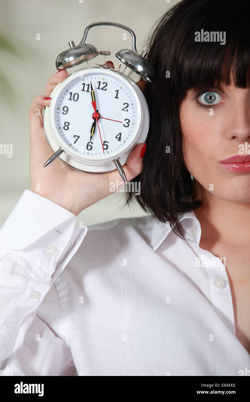 Woman clock head hi-res stock photography and images - Alamy