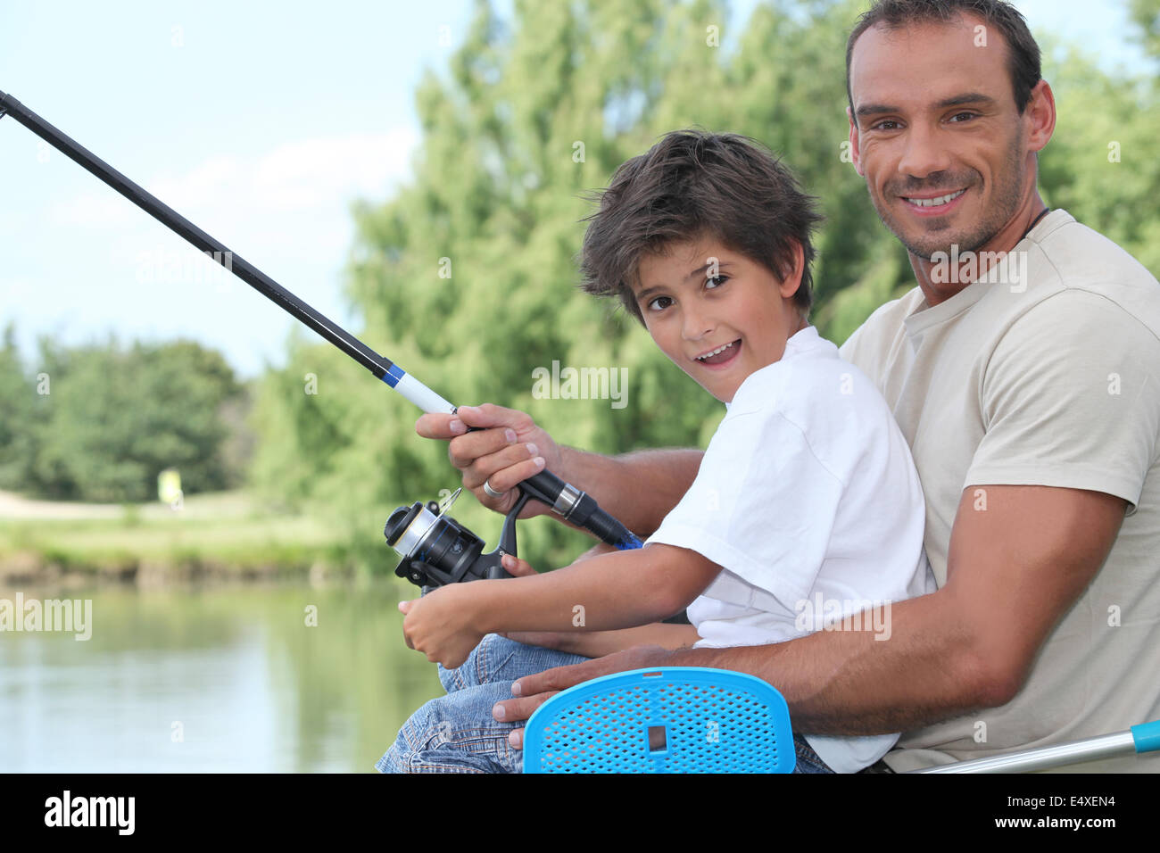father and son fishing Stock Photo - Alamy