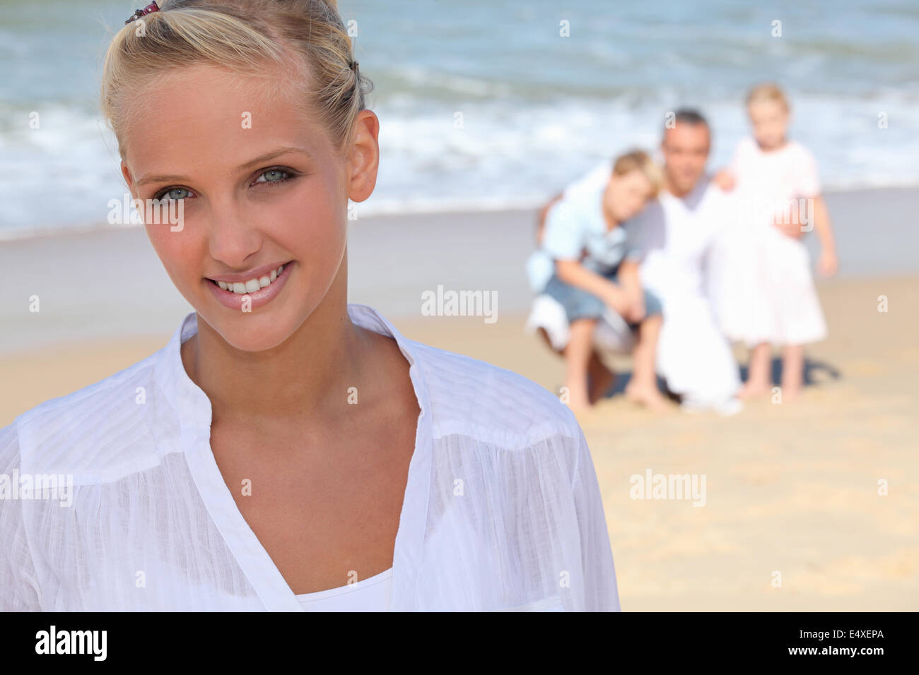 Smiling woman on seaside hi-res stock photography and images - Alamy