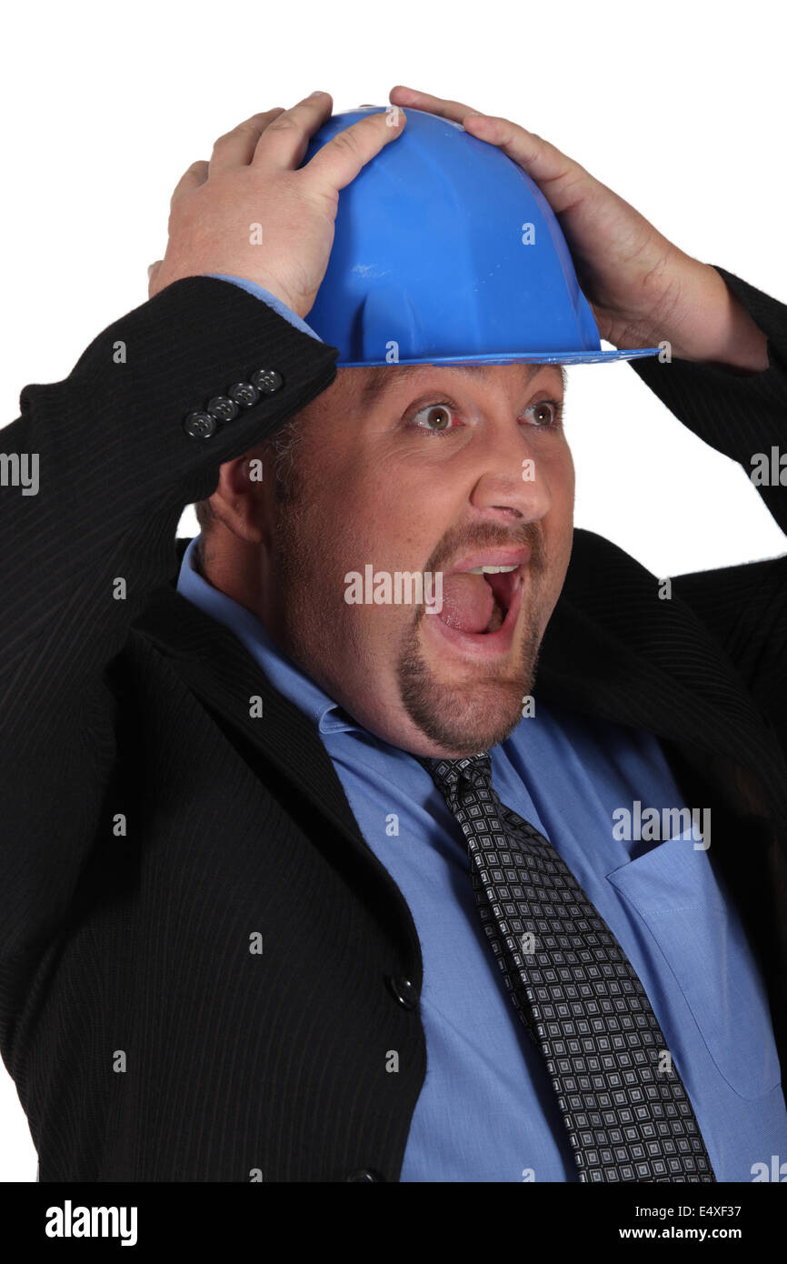 a real estate company boss is surprised Stock Photo - Alamy
