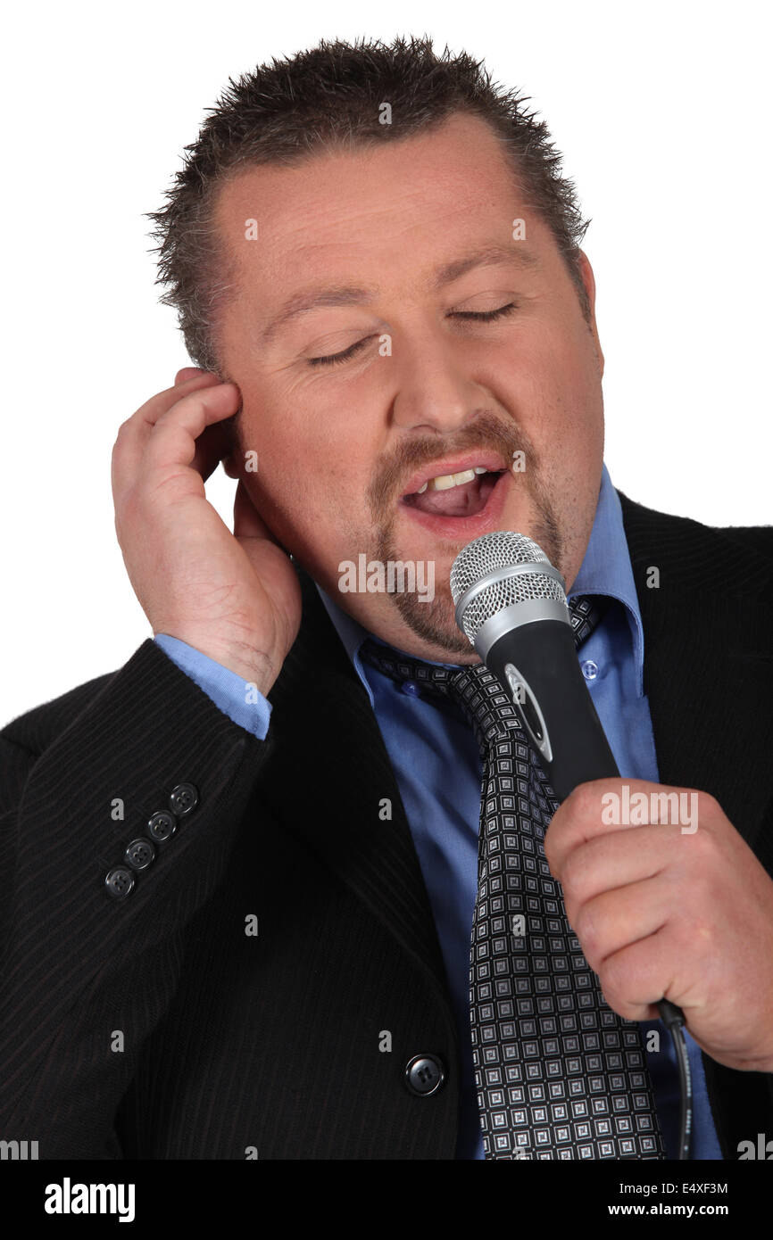 Singing into the microphone hi-res stock photography and images - Alamy