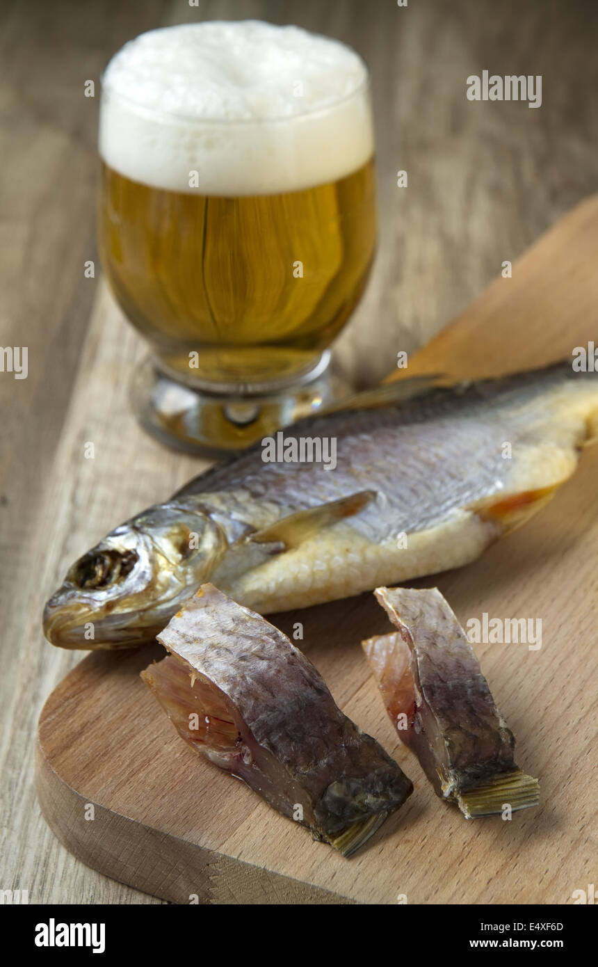 dried fish and beer Stock Photo - Alamy