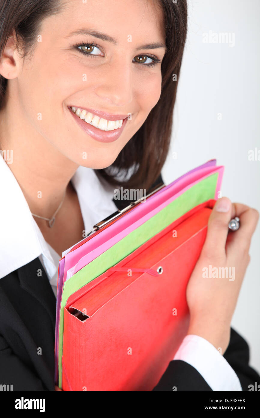 woman holding files Stock Photo - Alamy