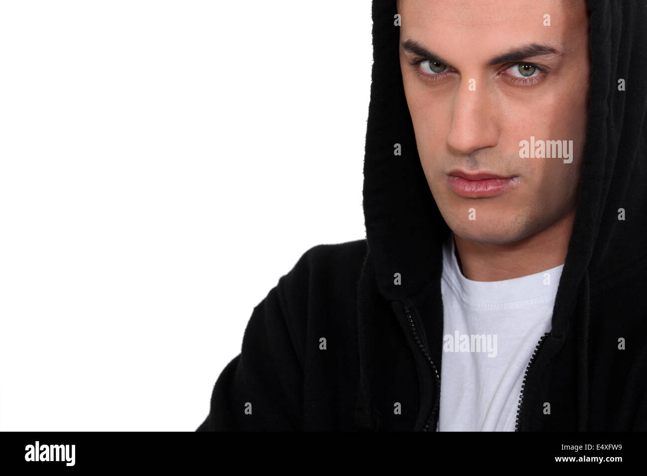 Moody man in hoodie Stock Photo - Alamy