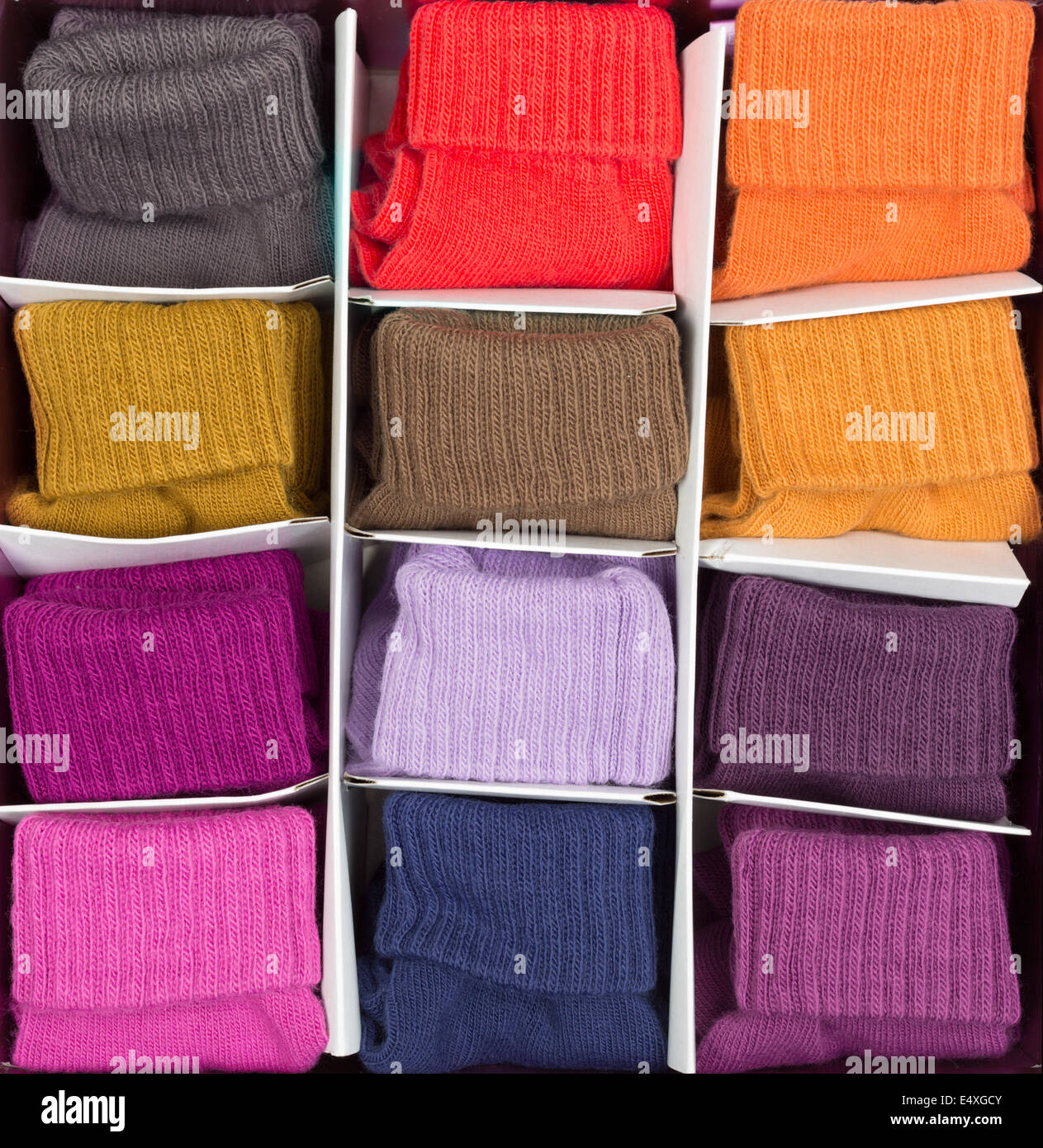 box of colored clothing Stock Photo - Alamy