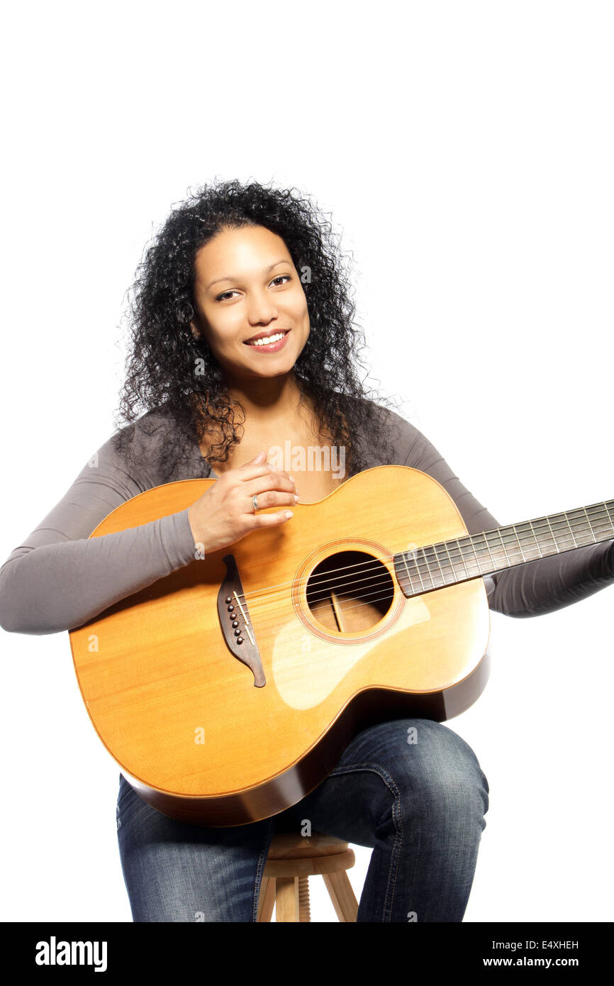 Playing Guitar Sitting On Stool Stock Photos & Playing Guitar Sitting ...
