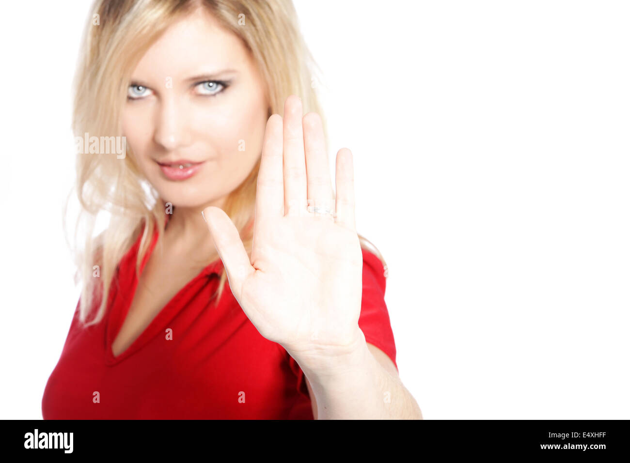 Woman making a cease and desist gesture Stock Photo - Alamy