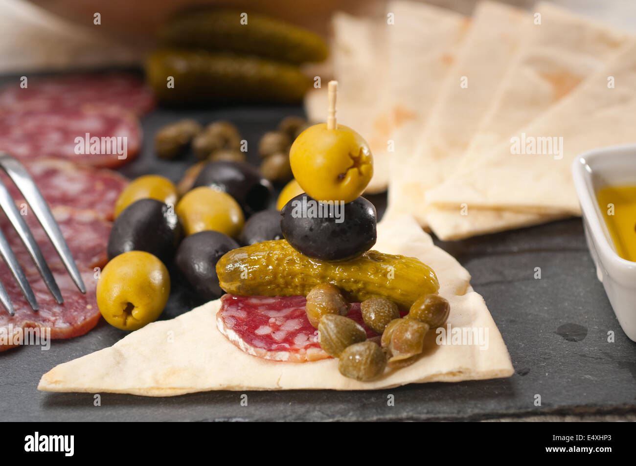cold cut platter with pita bread and pickles Stock Photo - Alamy