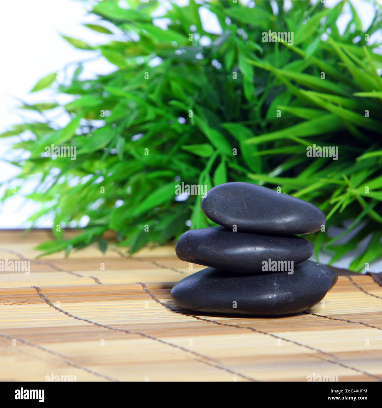 Massage stones in a spa Stock Photo - Alamy