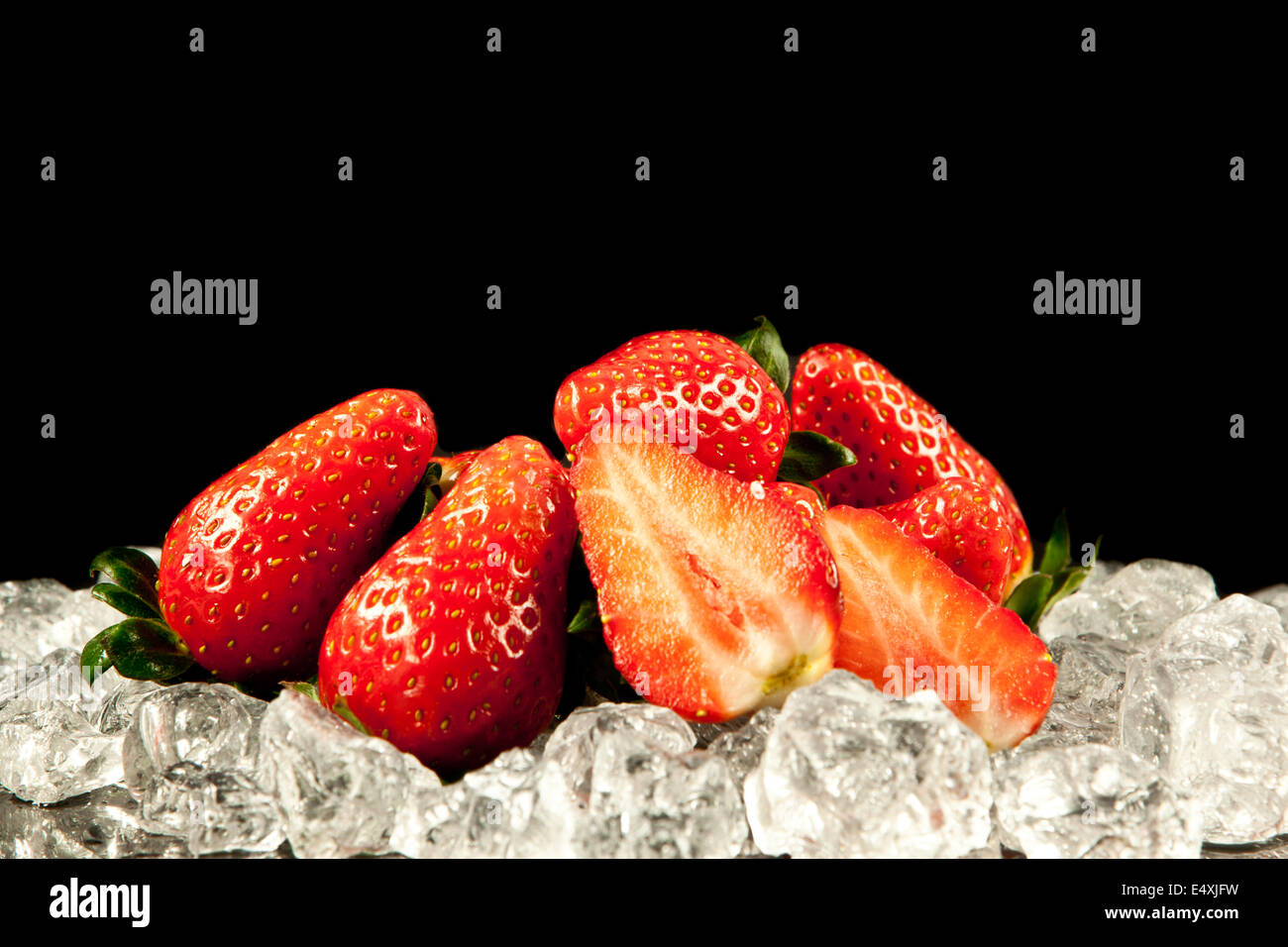 strawberry on black background Stock Photo - Alamy