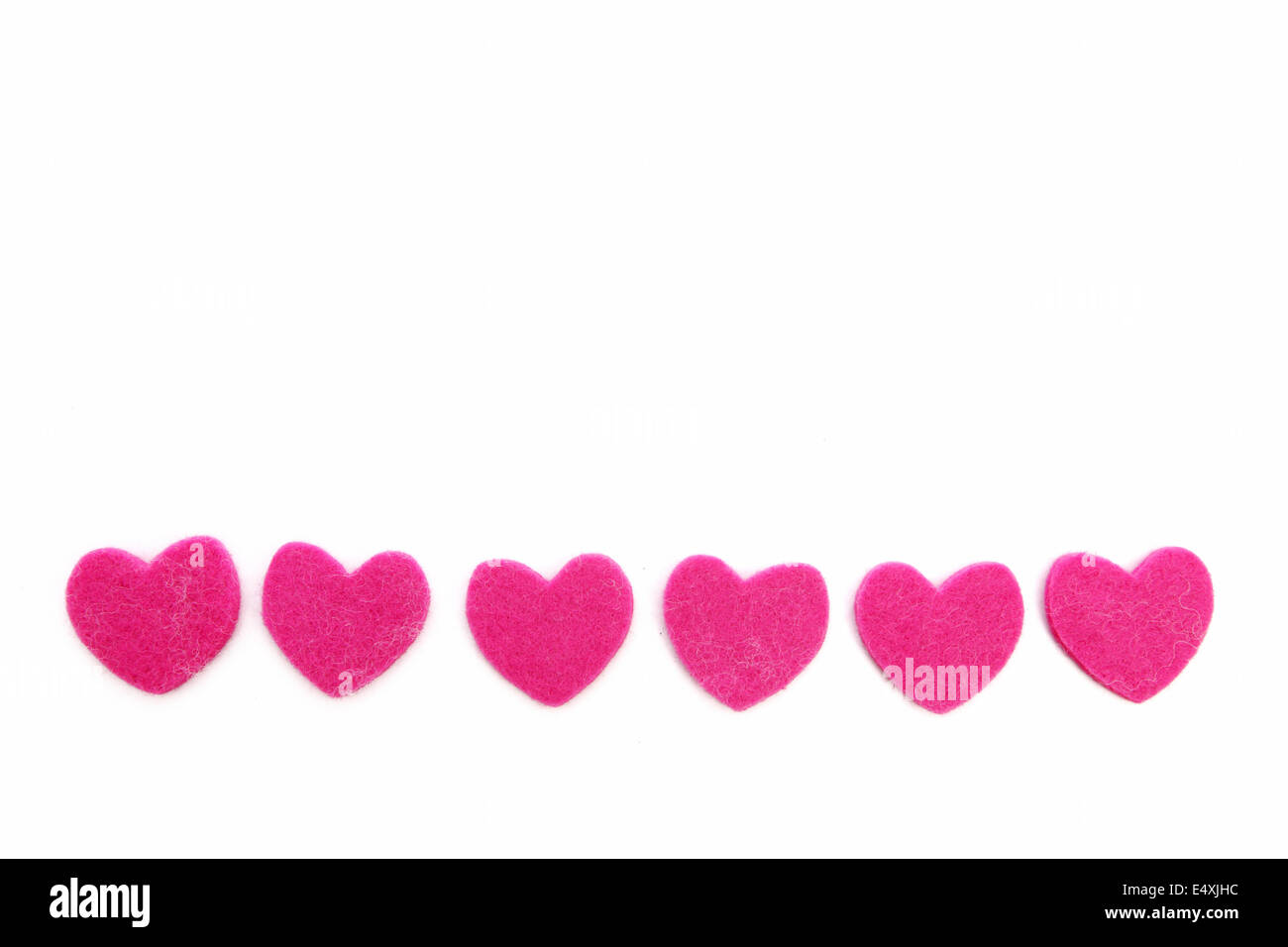Row of romantic pink hearts Stock Photo - Alamy