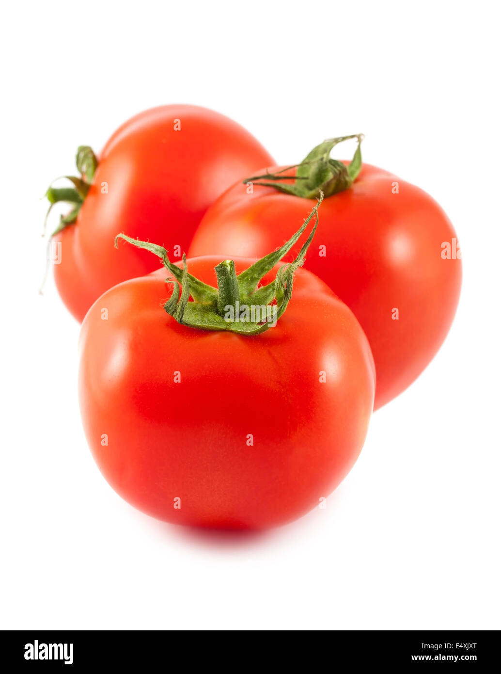 Three fresh whole tomatoes Cut Out Stock Images & Pictures - Alamy
