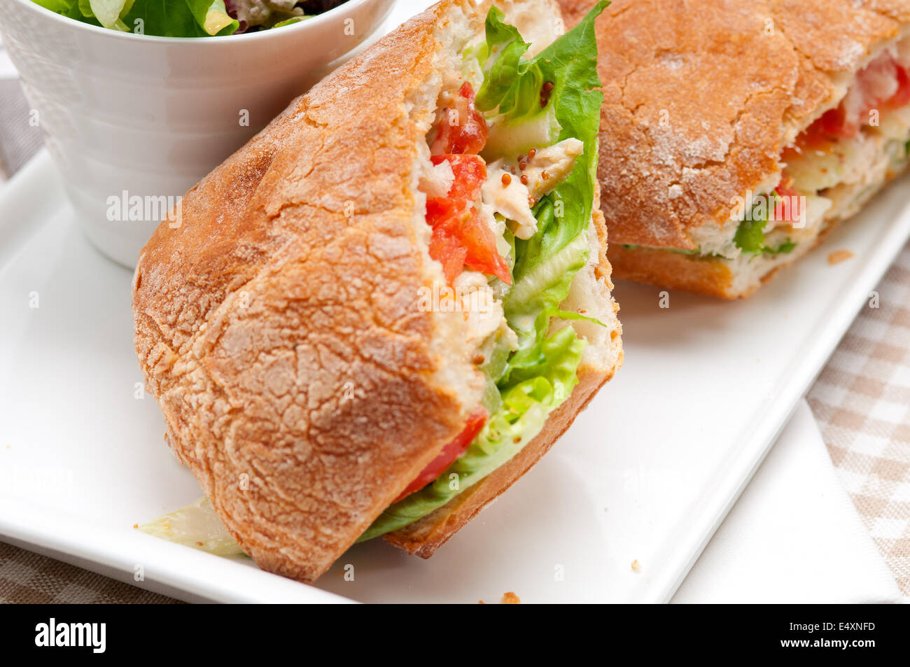 ciabatta panini sandwich with chicken and tomato Stock Photo - Alamy