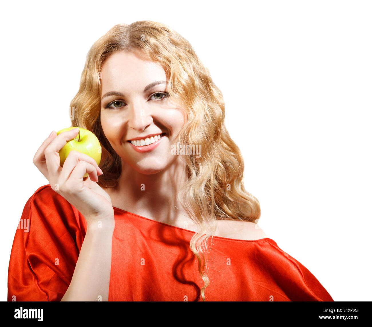 Woman in red holding apple in her hand Stock Photo - Alamy